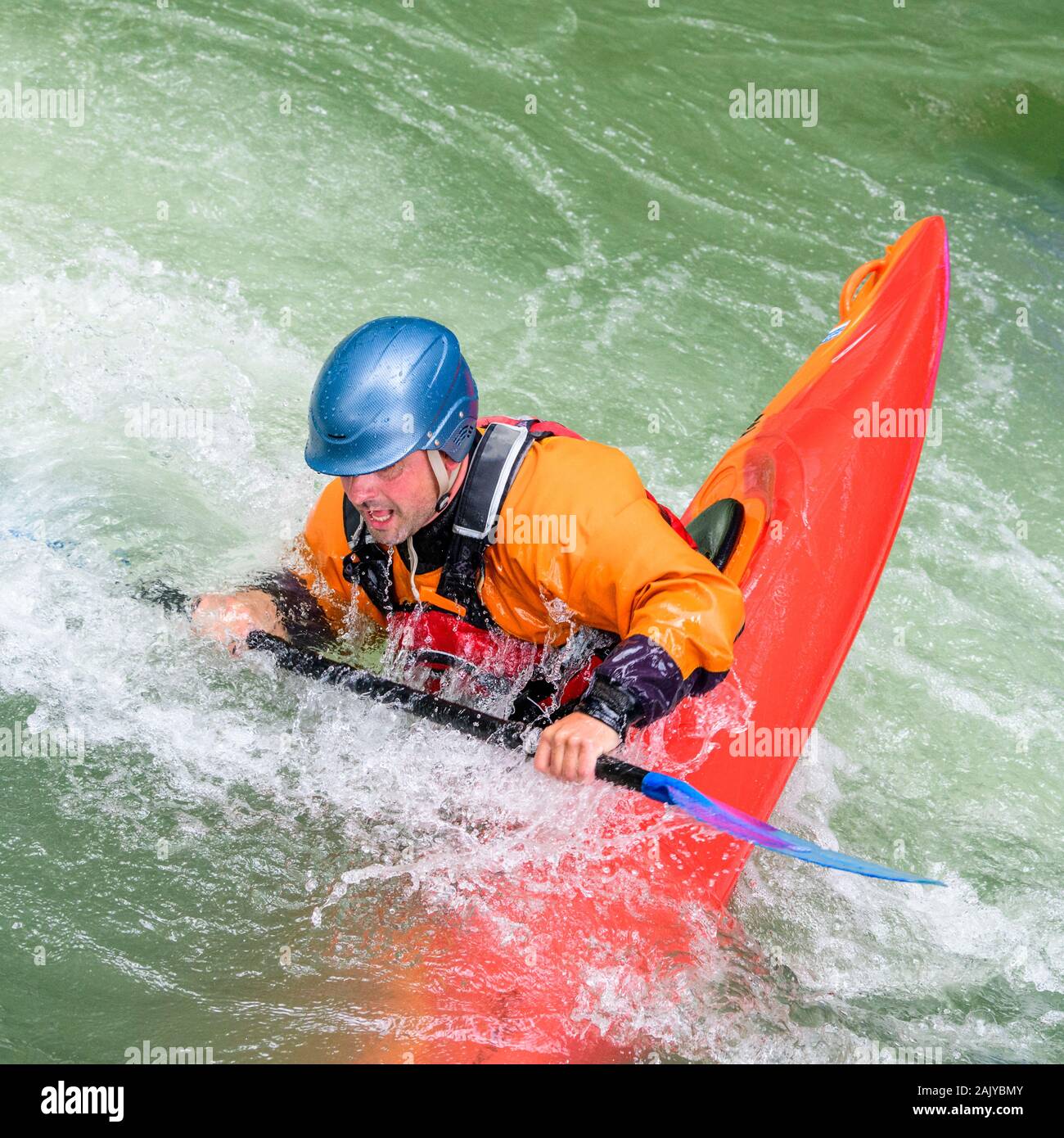 Kayaking on an artificial wild water channel Stock Photo - Alamy