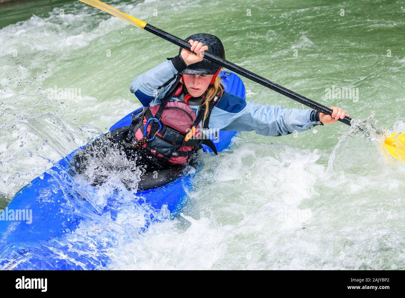 Kayaking on an artificial wild water channel Stock Photo - Alamy