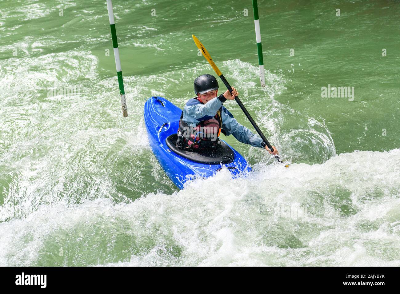 Kayaking on an artificial wild water channel Stock Photo - Alamy