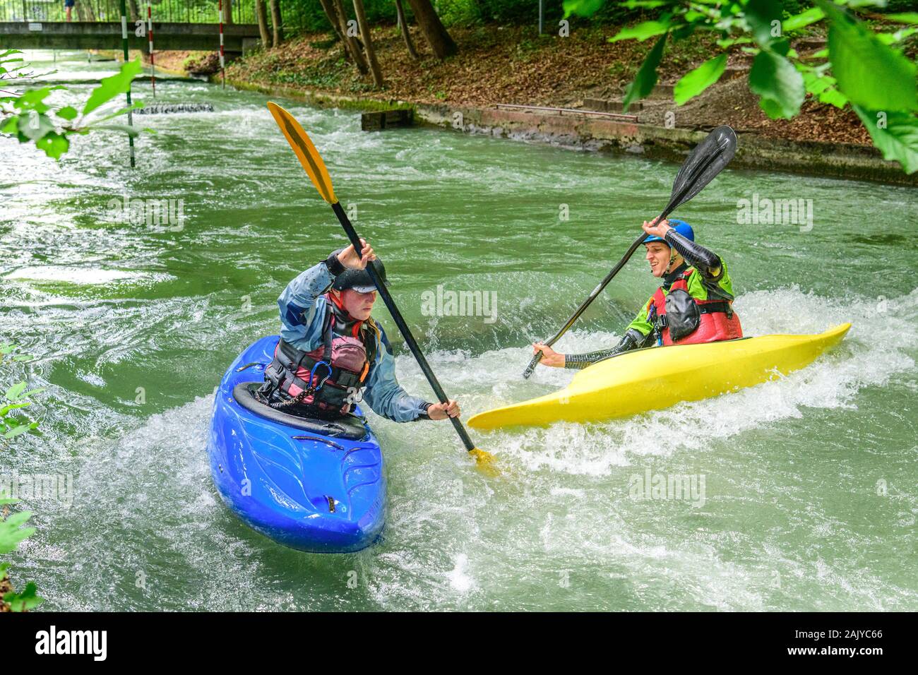 Kayaking on an artificial wild water channel Stock Photo - Alamy