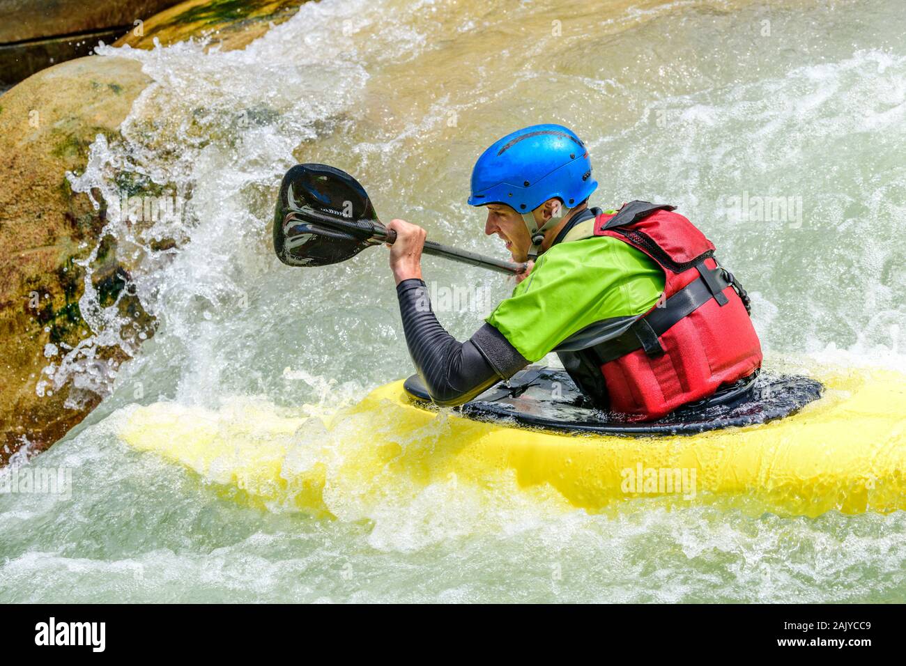 Kayaking on an artificial wild water channel Stock Photo - Alamy