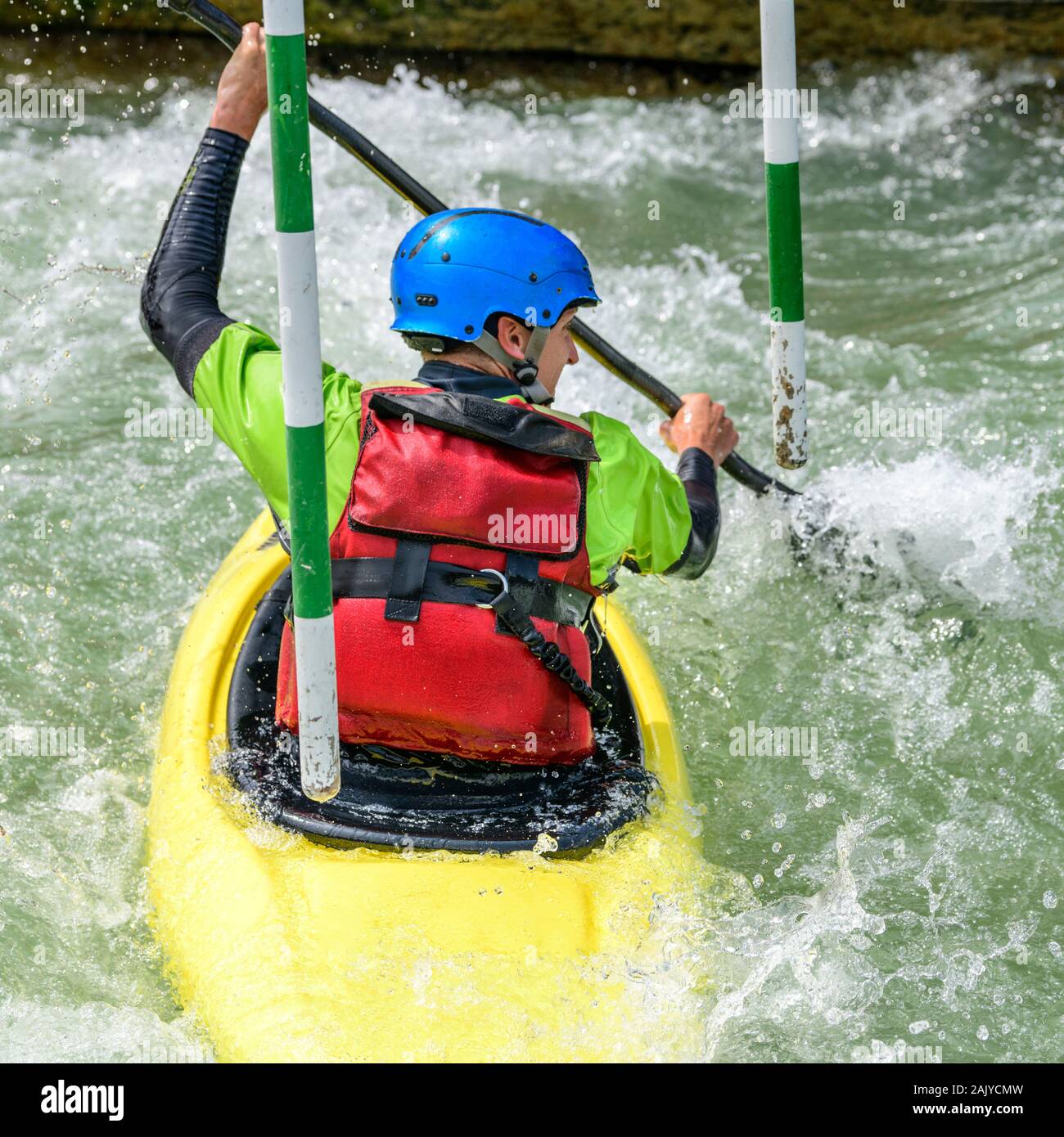 Kayaking on an artificial wild water channel Stock Photo - Alamy