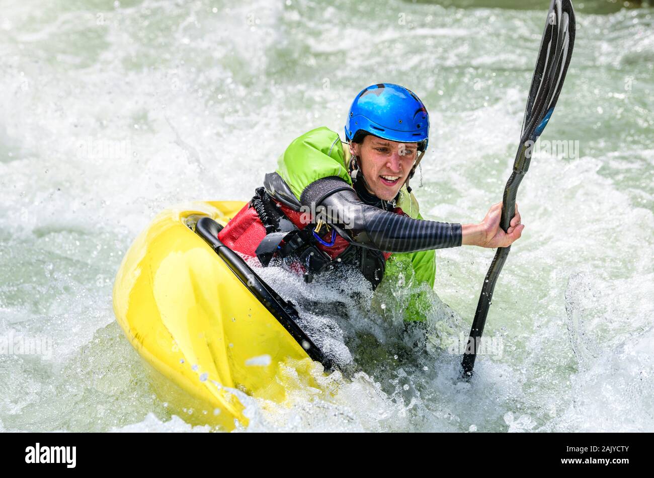 Kayaking on an artificial wild water channel Stock Photo - Alamy