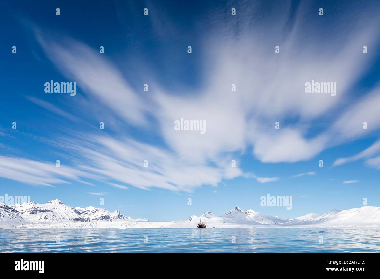 Boat on the fjords of Svalbard, a Norwegian archipelago between ...