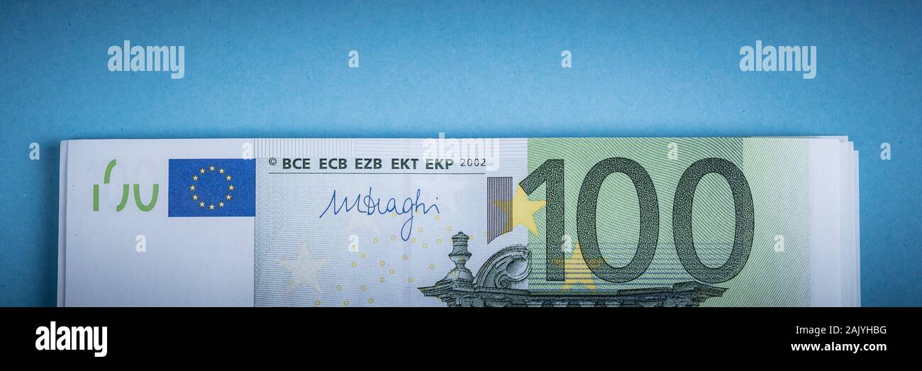 Euro cash on a blue and pink background. Euro Money Banknotes. Euro ...