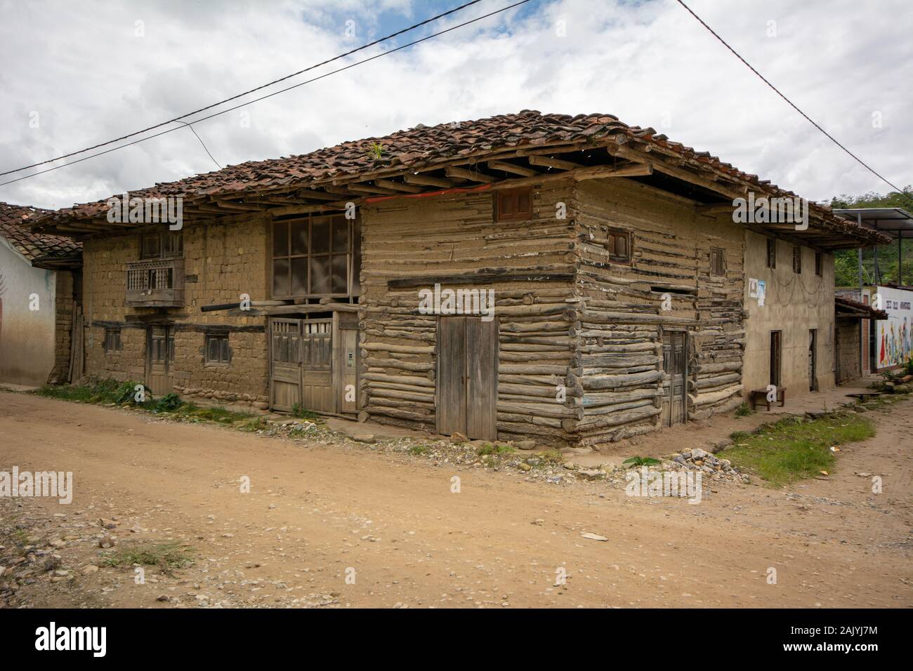 Typical house of timber frame and mud construction in the eastern Andes ...