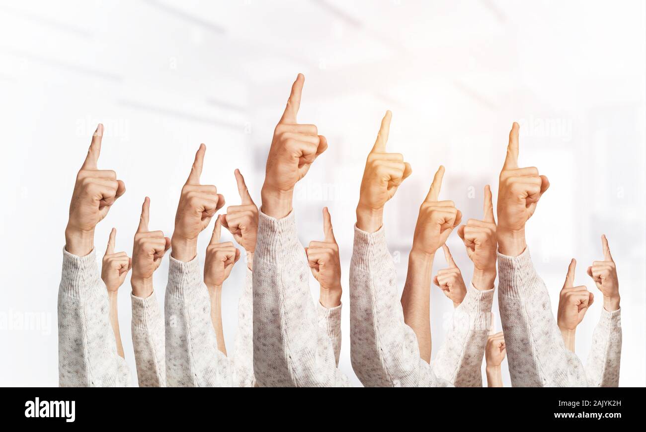 Row of man hands showing finger pointing gesture Stock Photo - Alamy