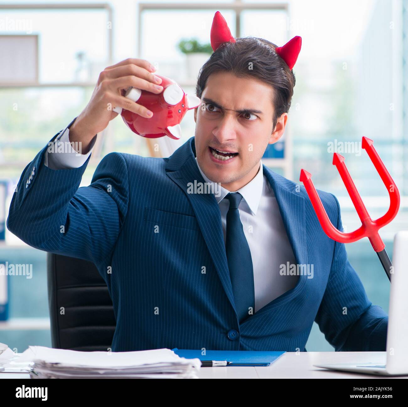 The devil angry businessman in the office Stock Photo - Alamy