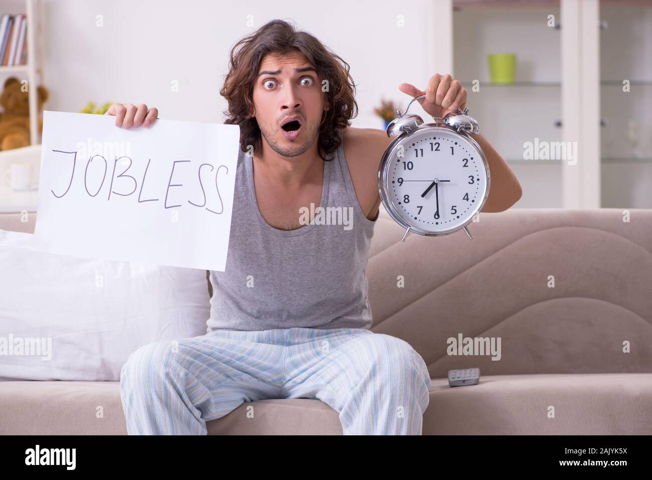 The unemployed man desperate at home Stock Photo - Alamy