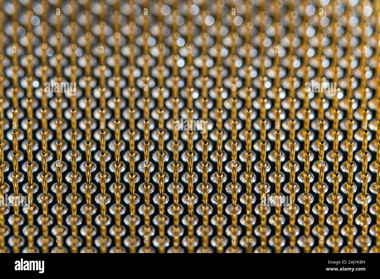 Close-up full frame view of gold plated microprocessor pin array ...