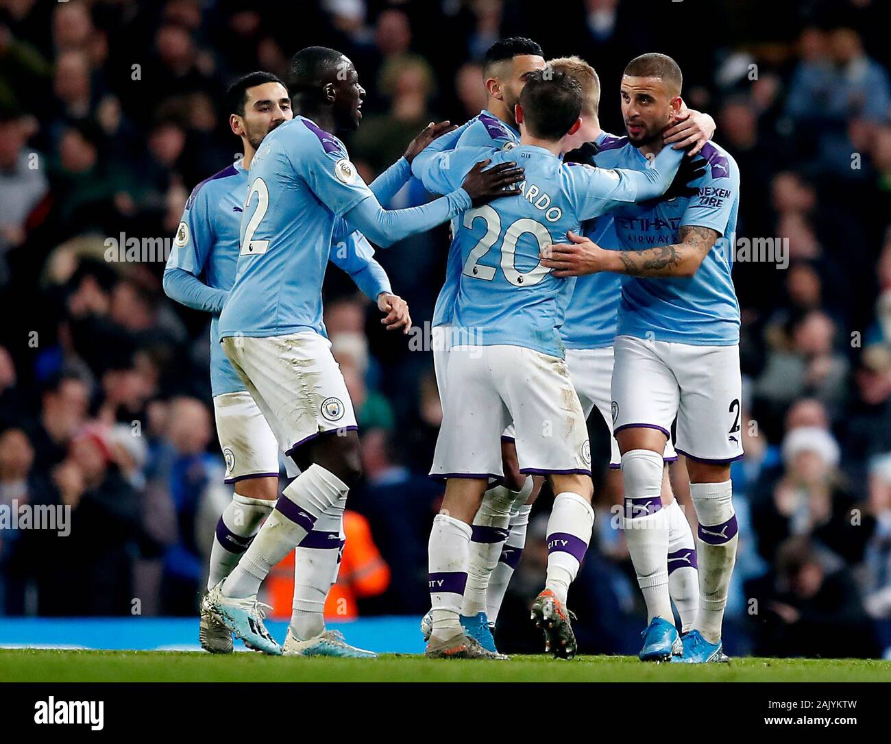 Manchester City's Riyad Mahrez celebrates scoring his side's first goal ...