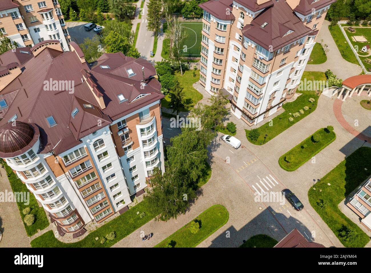Top view of apartment or office tall buildings, parked cars, urban city ...