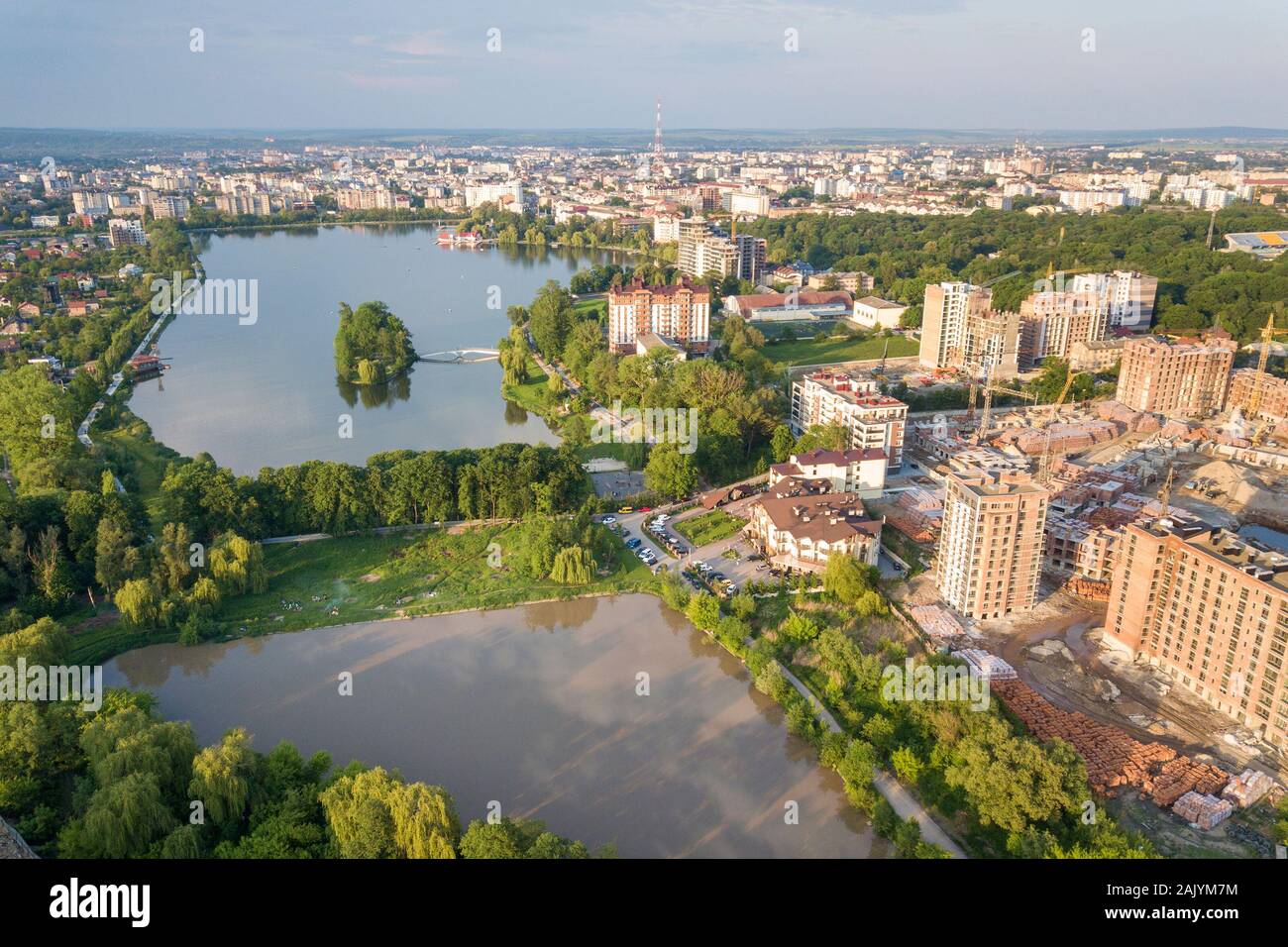 Top view of urban developing city landscape with tall apartment ...