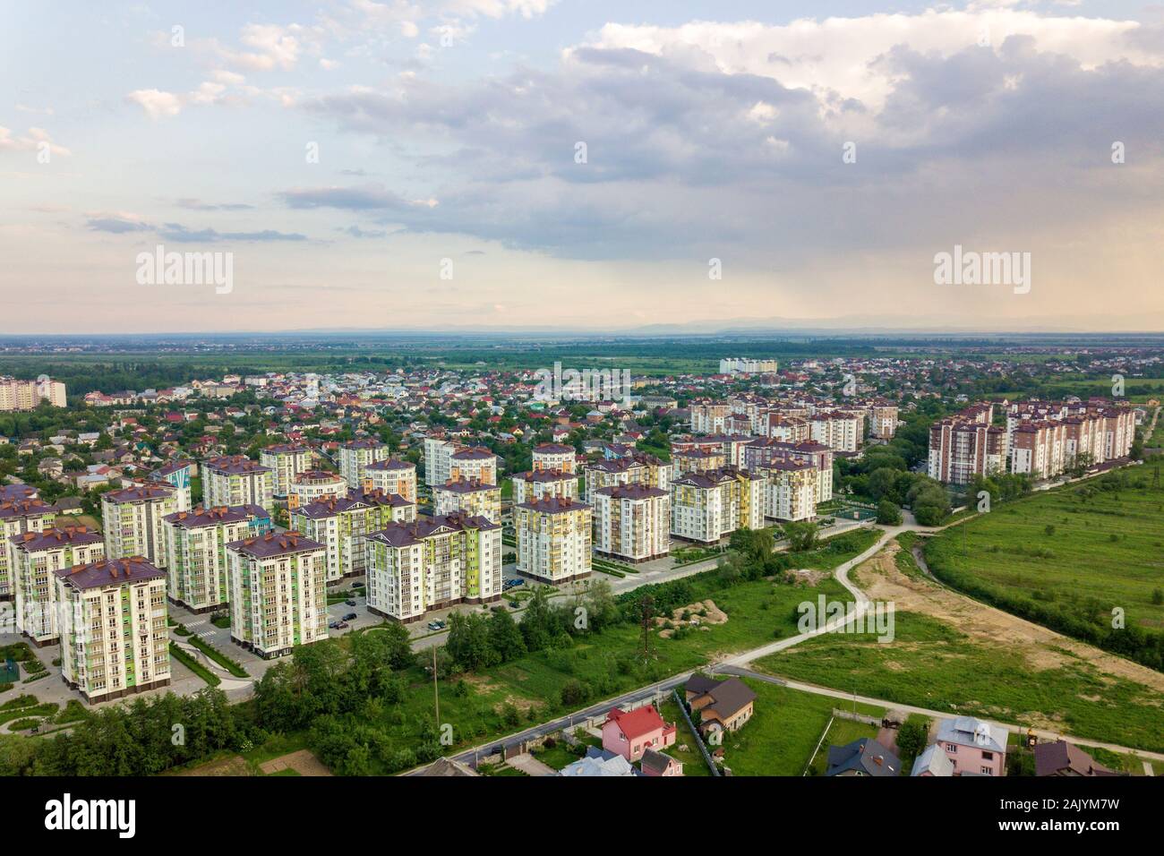 Top view of urban developing city landscape with tall apartment ...