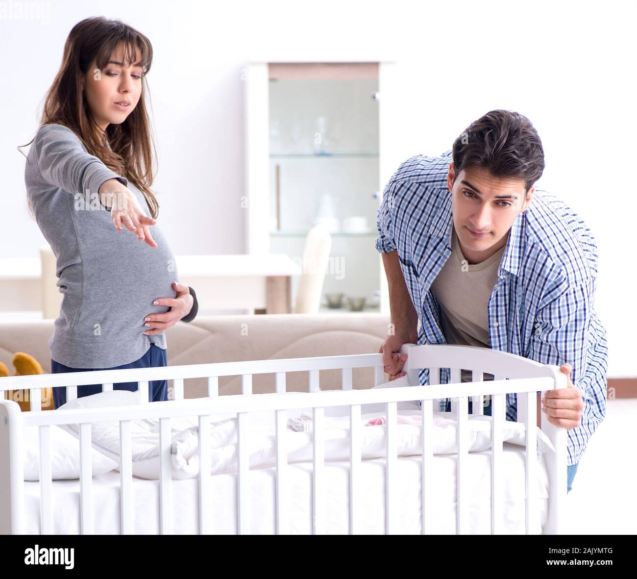 Expectant parents showing belly at hi-res stock photography and images ...