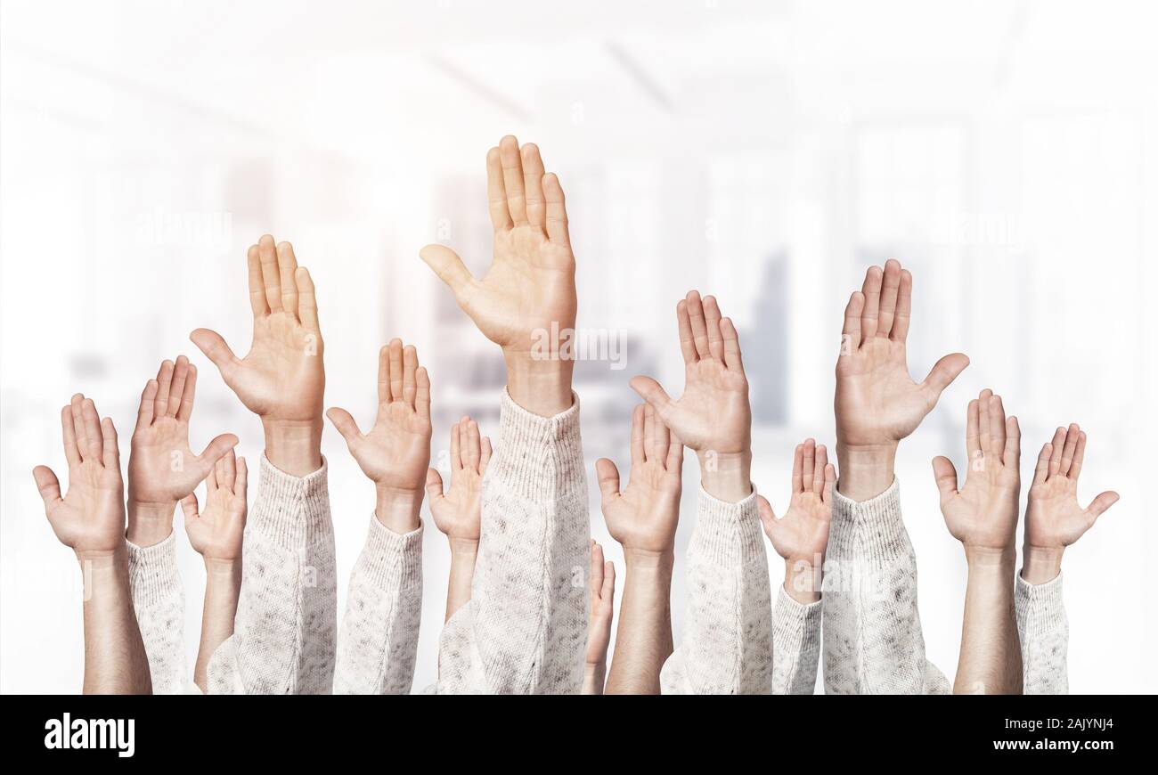 Row of man hands showing voting gesture Stock Photo - Alamy