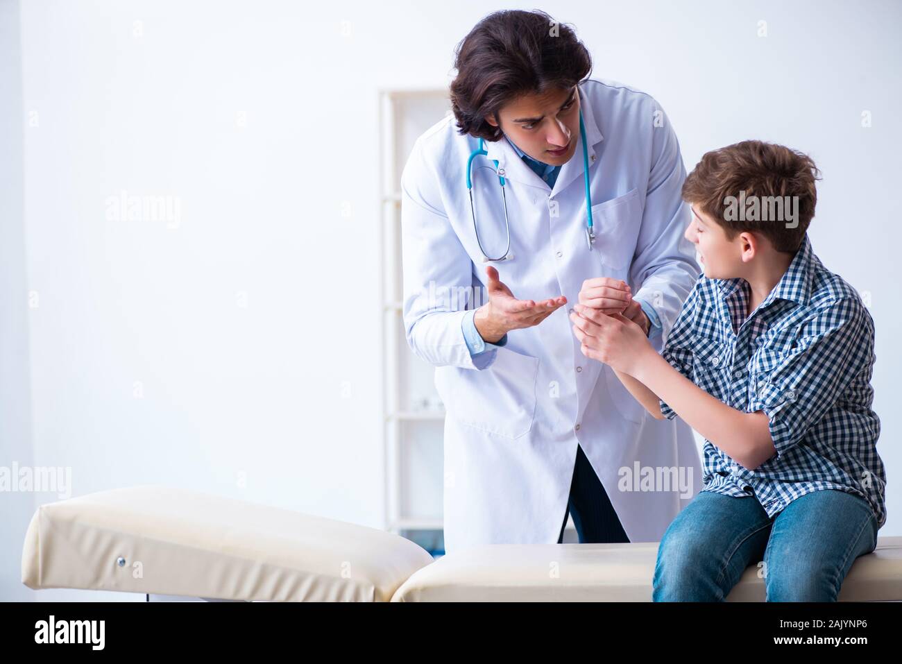 Injured teenager boy hospital hi-res stock photography and images - Alamy