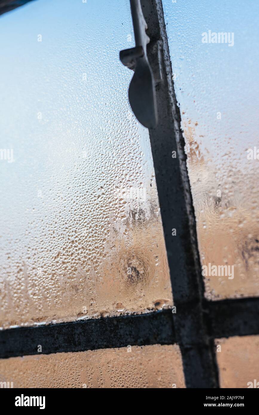 Steamy windows dripping with condensation Stock Photo - Alamy