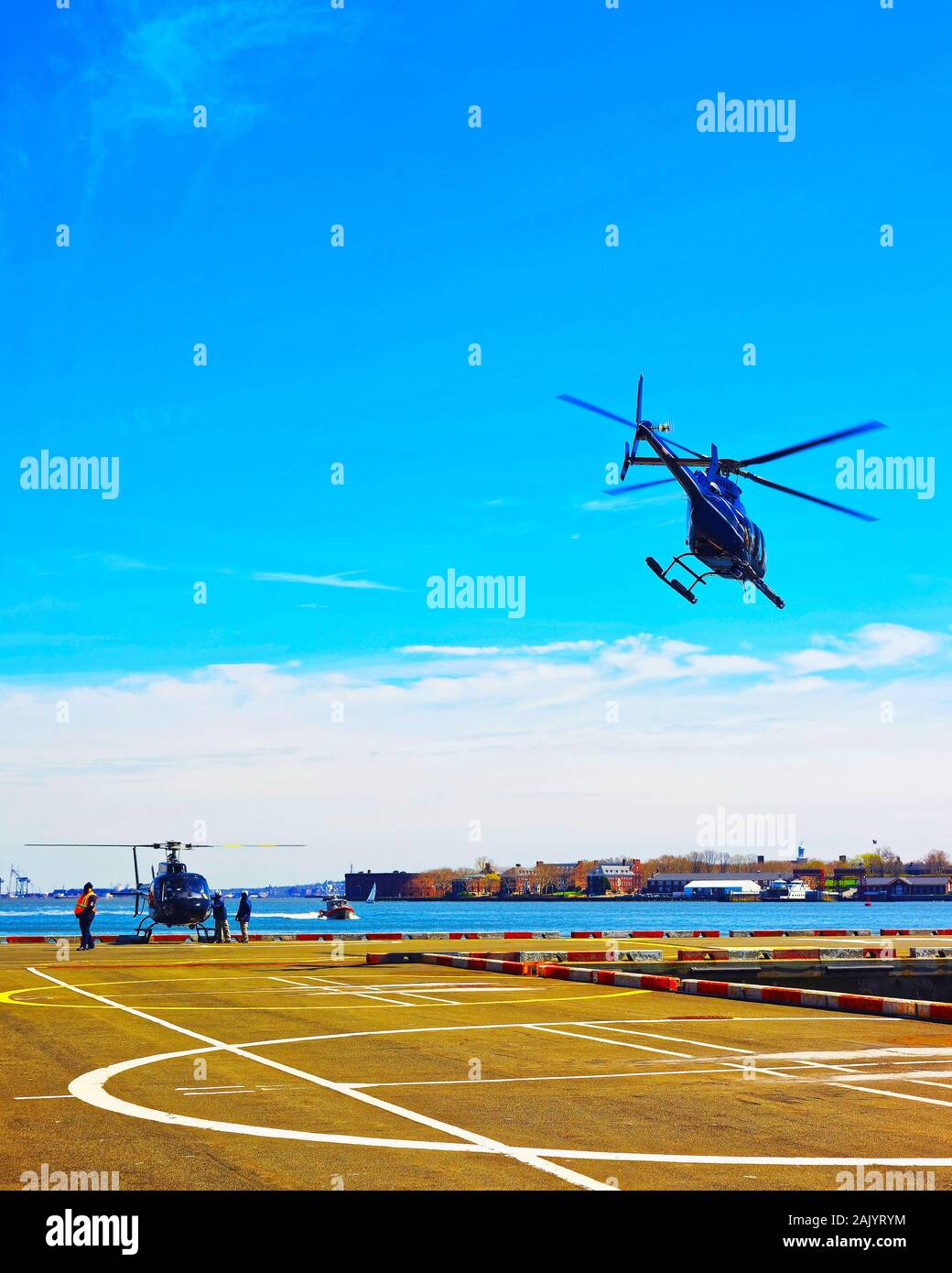 Black Helicopters in helipad in Lower Manhattan reflex Stock Photo - Alamy