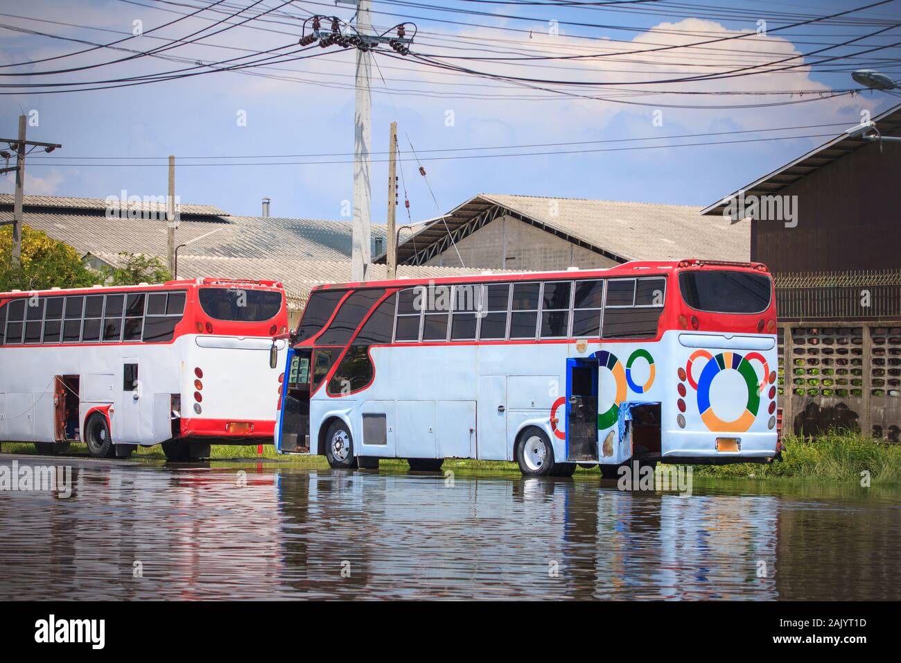 The bus was parked on the street flooding Stock Photo - Alamy