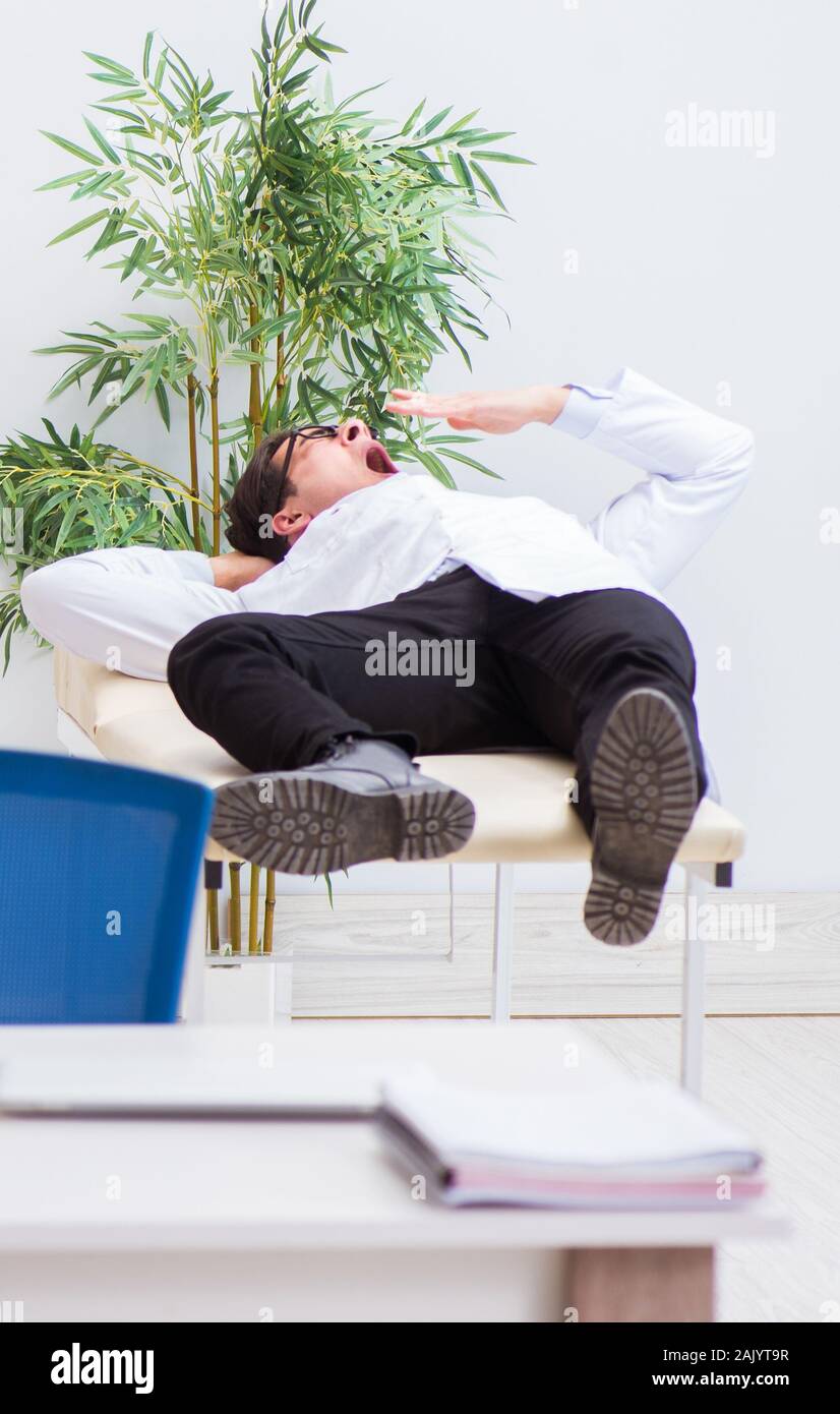 Doctor relaxing after complex surgery in hospital Stock Photo - Alamy