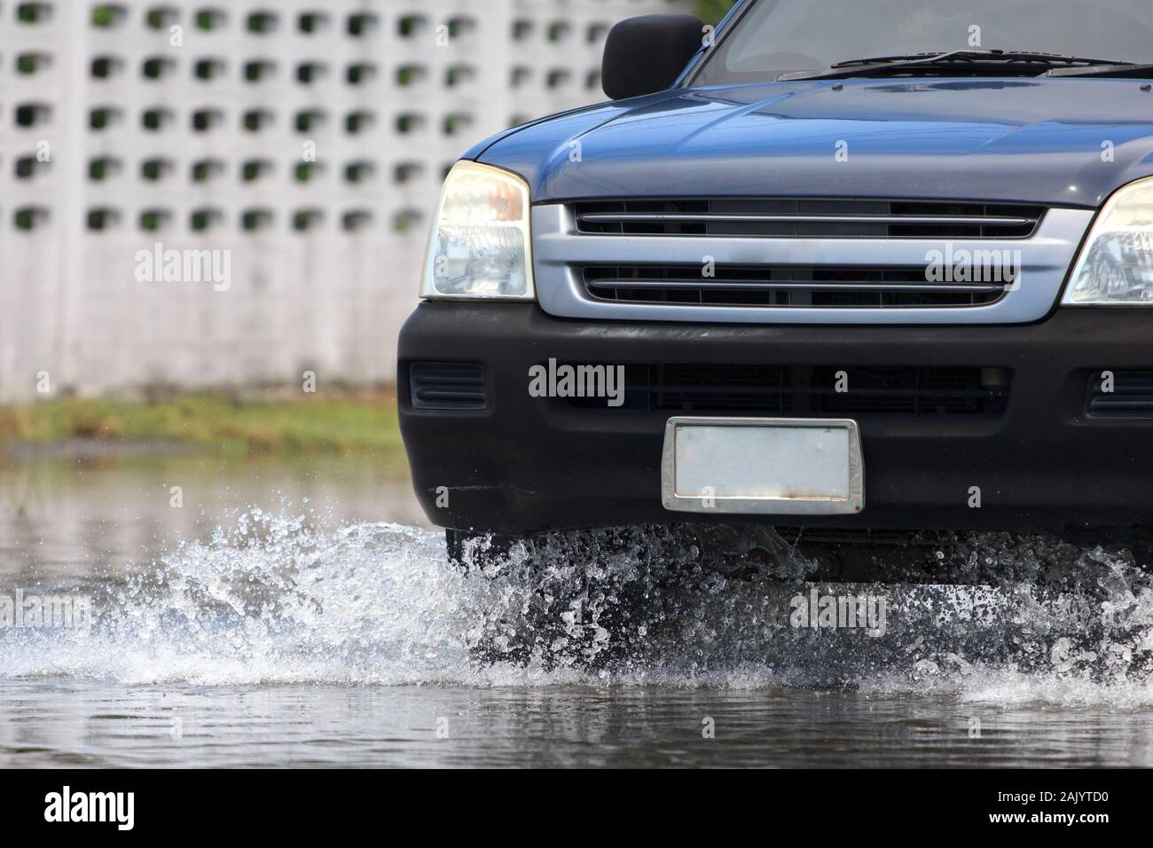 Car splashing through a puddle hi-res stock photography and images - Alamy