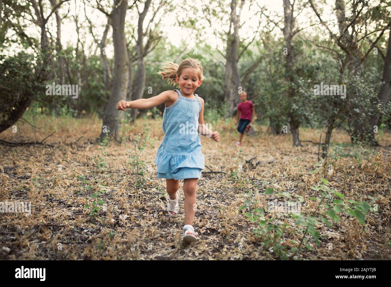 Children running blur hi-res stock photography and images - Alamy