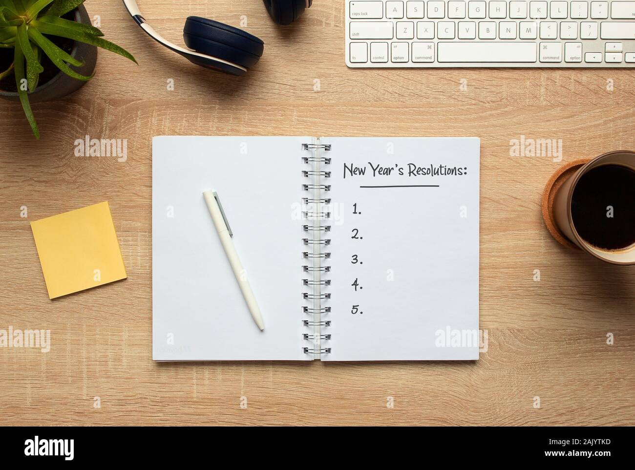 Stock photo of new year notebook with list of resolutions and objects ...