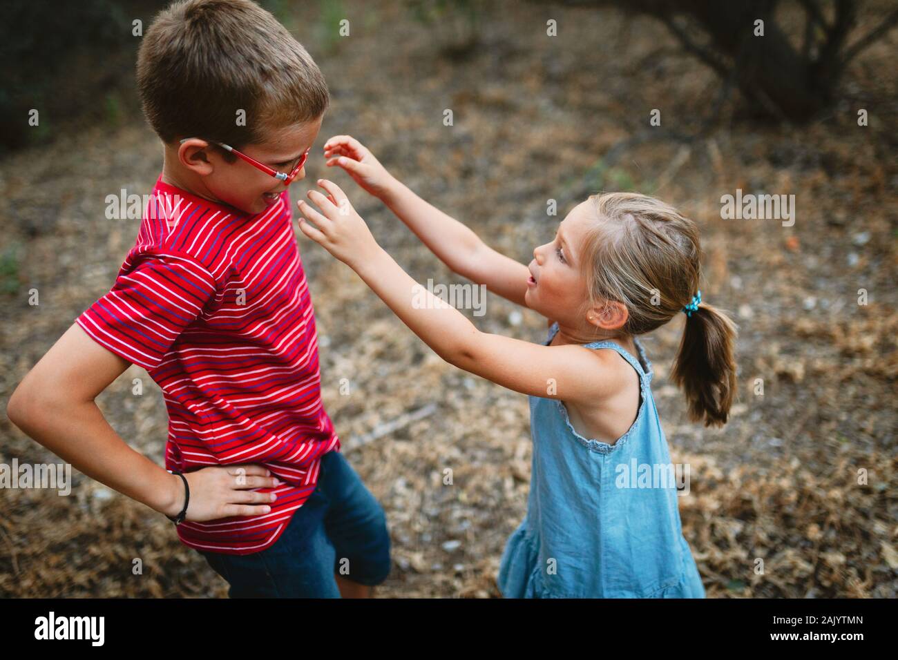 Two kids playing dancing hi-res stock photography and images - Alamy