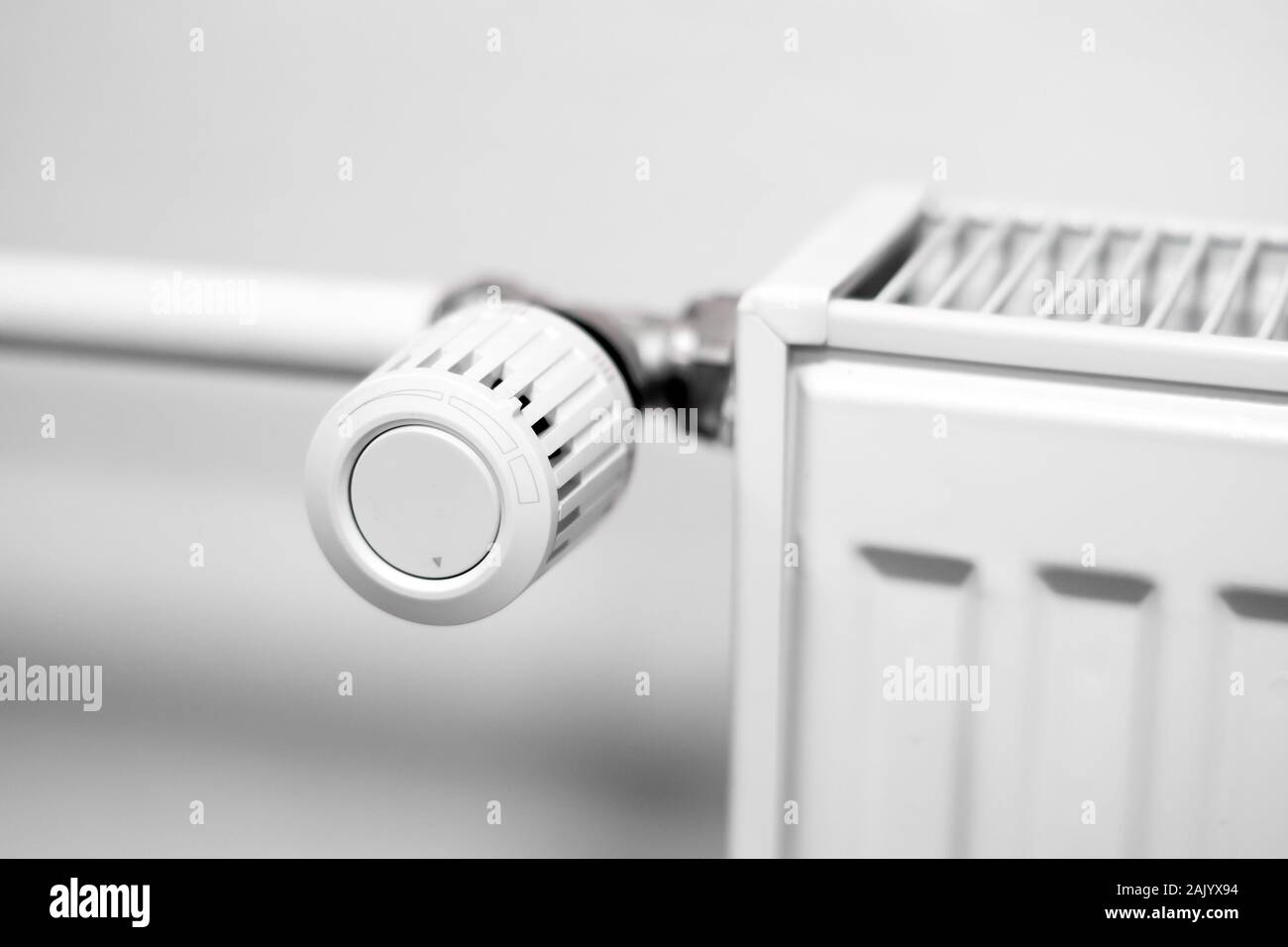 control valve on a central heating radiator in a room Stock Photo - Alamy