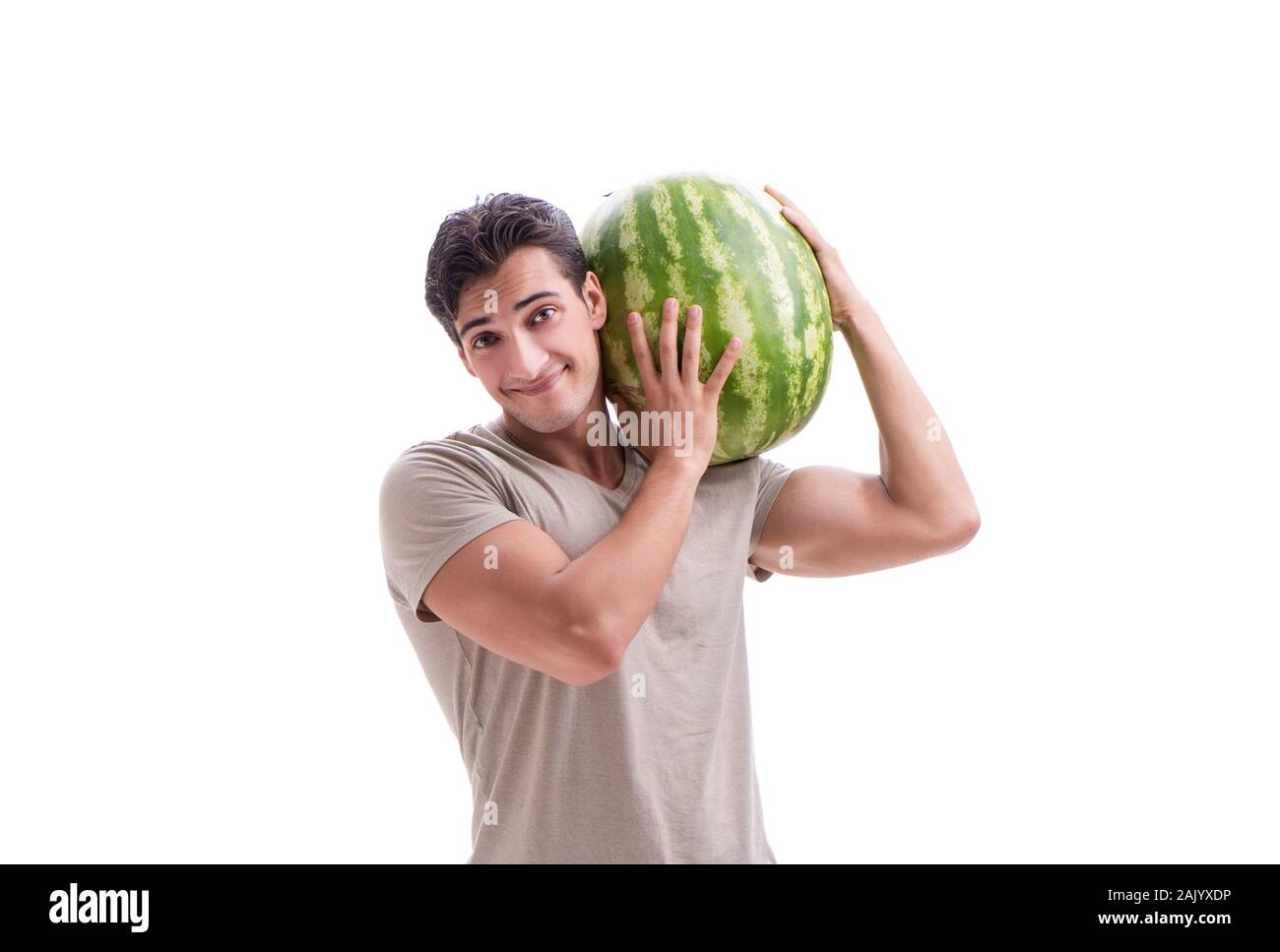 The young man with watermelon isolated on white Stock Photo - Alamy