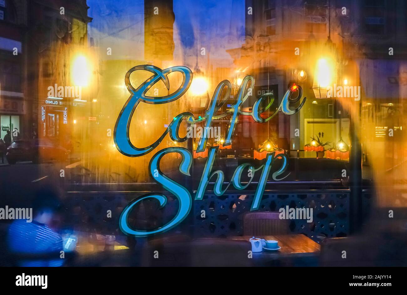 Night lights in the window of a Liverpool coffee shop Stock Photo - Alamy