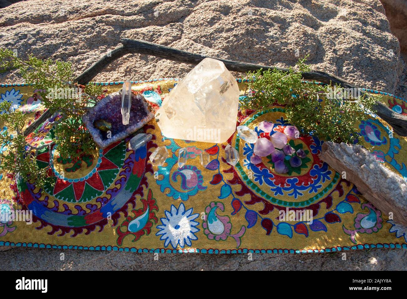 Crystal altar in the desert with a mountain landscape Stock Photo - Alamy