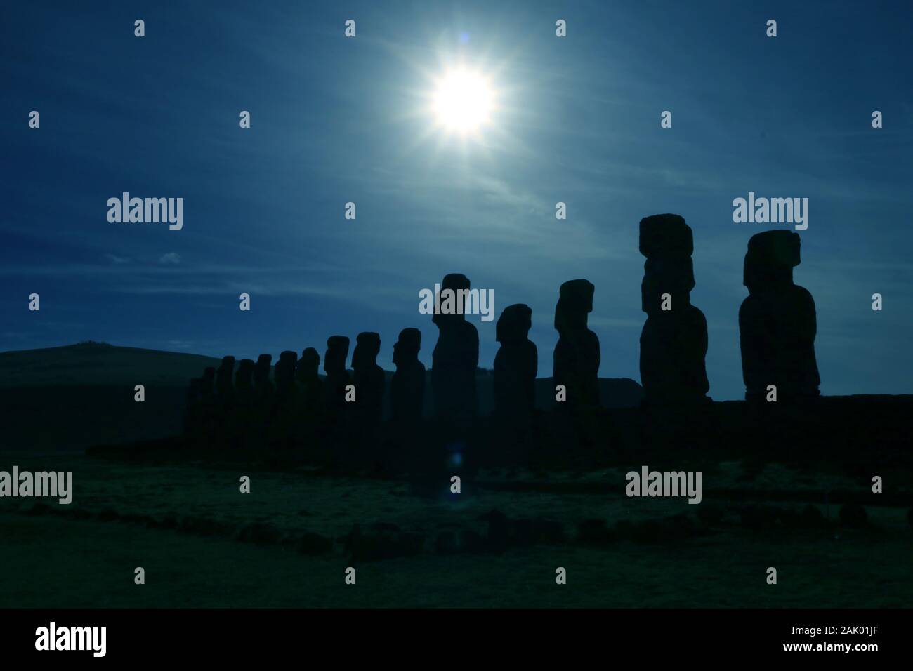 Pop art style blue colored gigantic Moai statues silhouette at Ahu ...