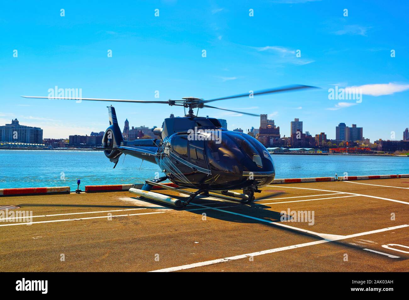 Black Helicopter on helipad in Lower Manhattan in New York reflex Stock ...