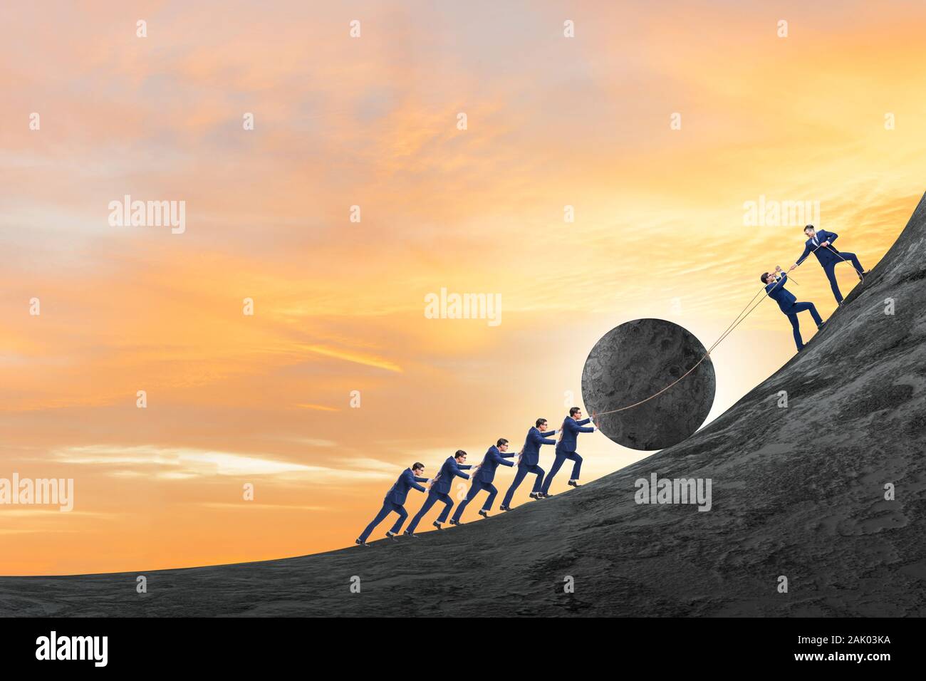 The teamwork example with business people pushing stone to top Stock ...