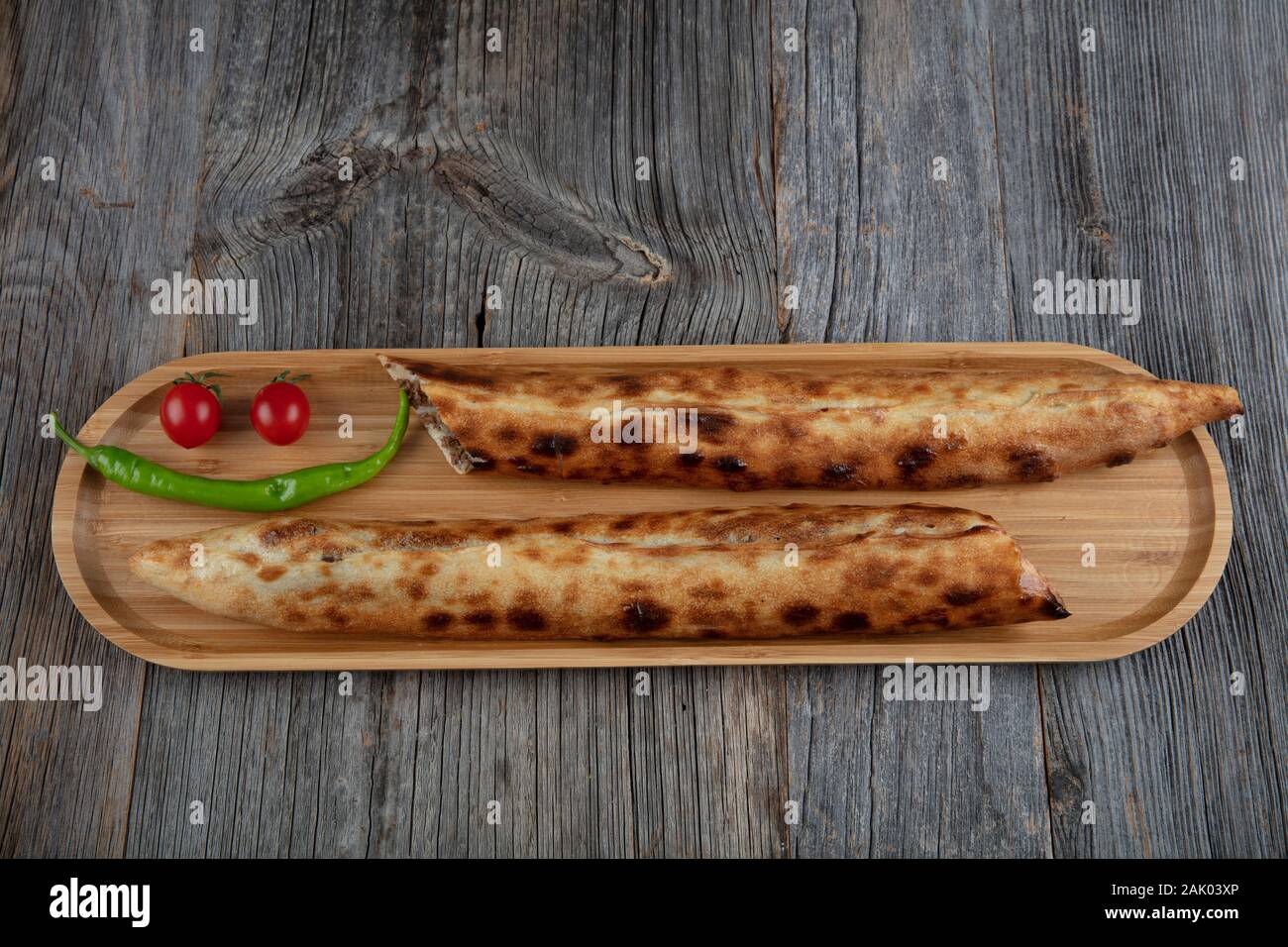 Traditional Turkish Cuisine Bafra pita (karadeniz pidesi) on rustic ...