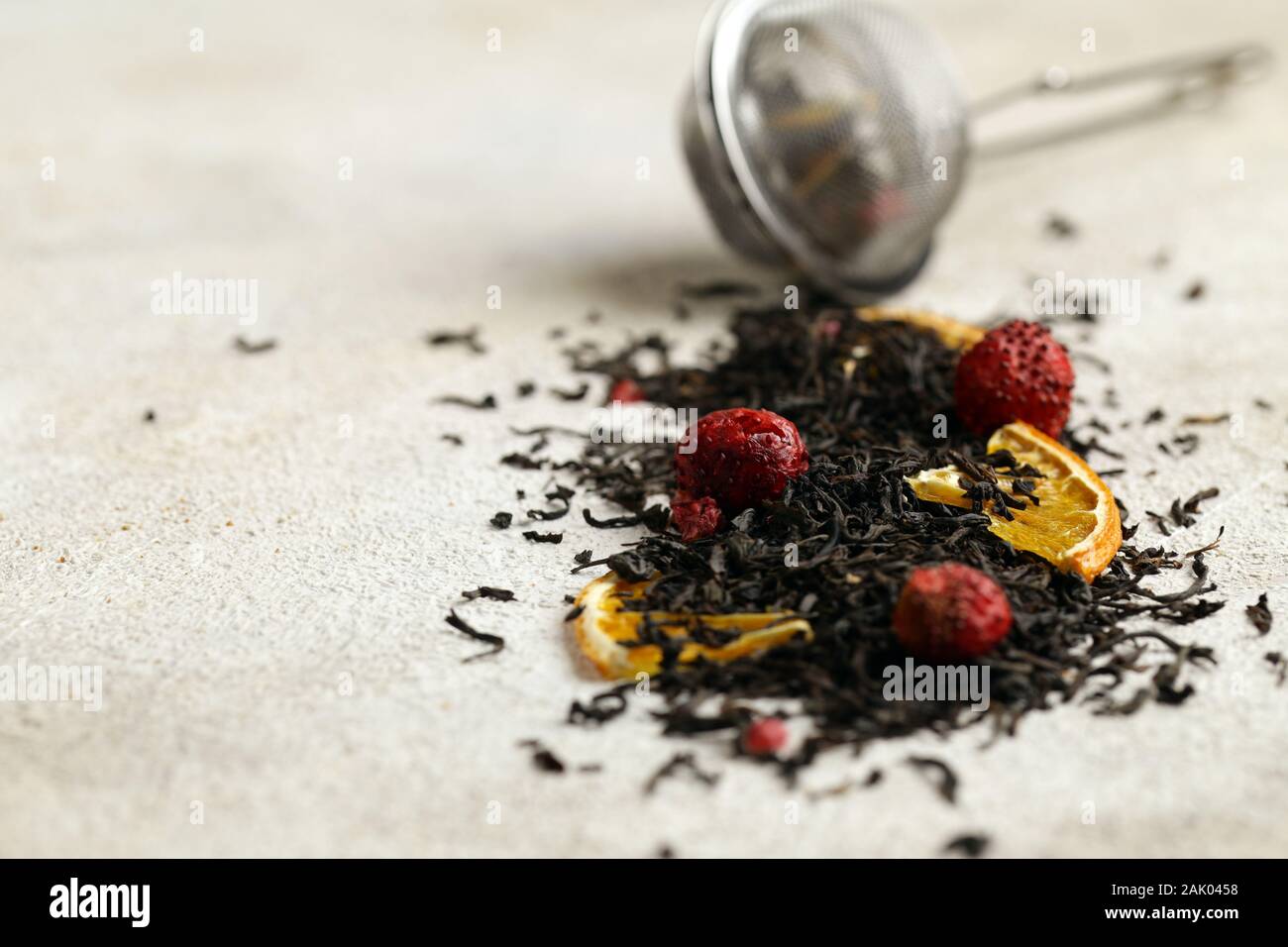 black tea with berries and fruits Stock Photo - Alamy