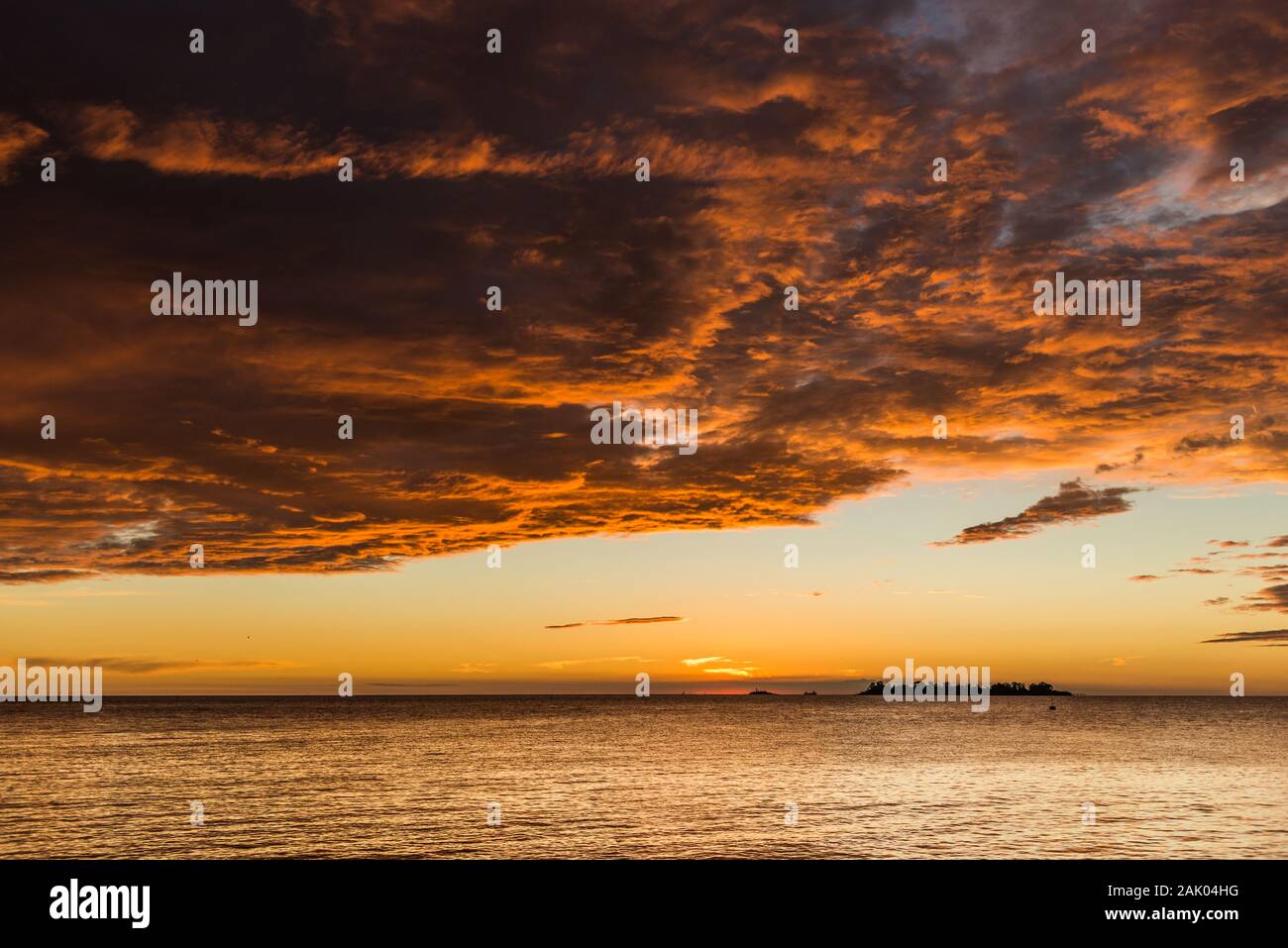 Landscape nature of sunset sky at the beach and colorful shiny sea ...