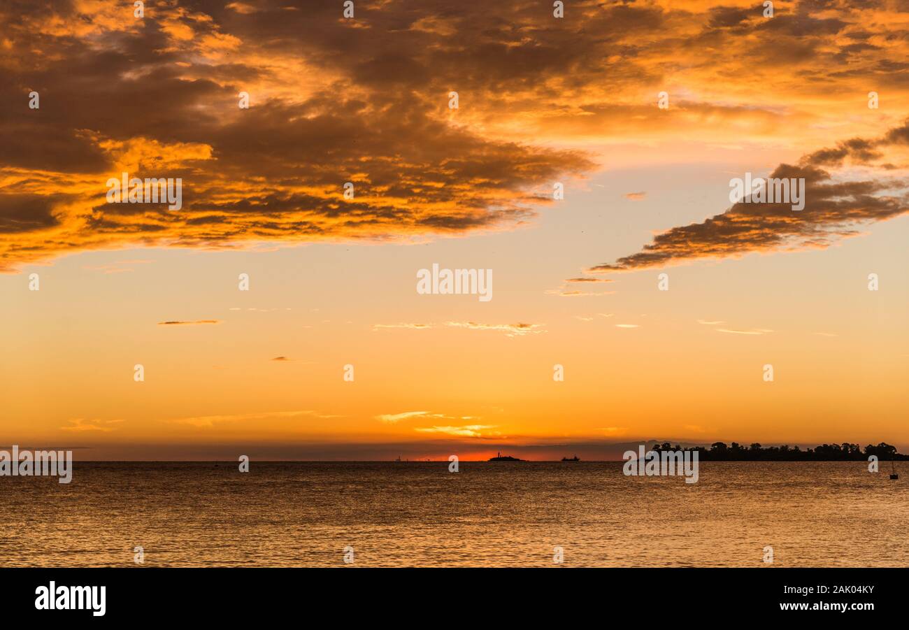 Landscape nature of sunset sky at the beach and colorful shiny sea ...