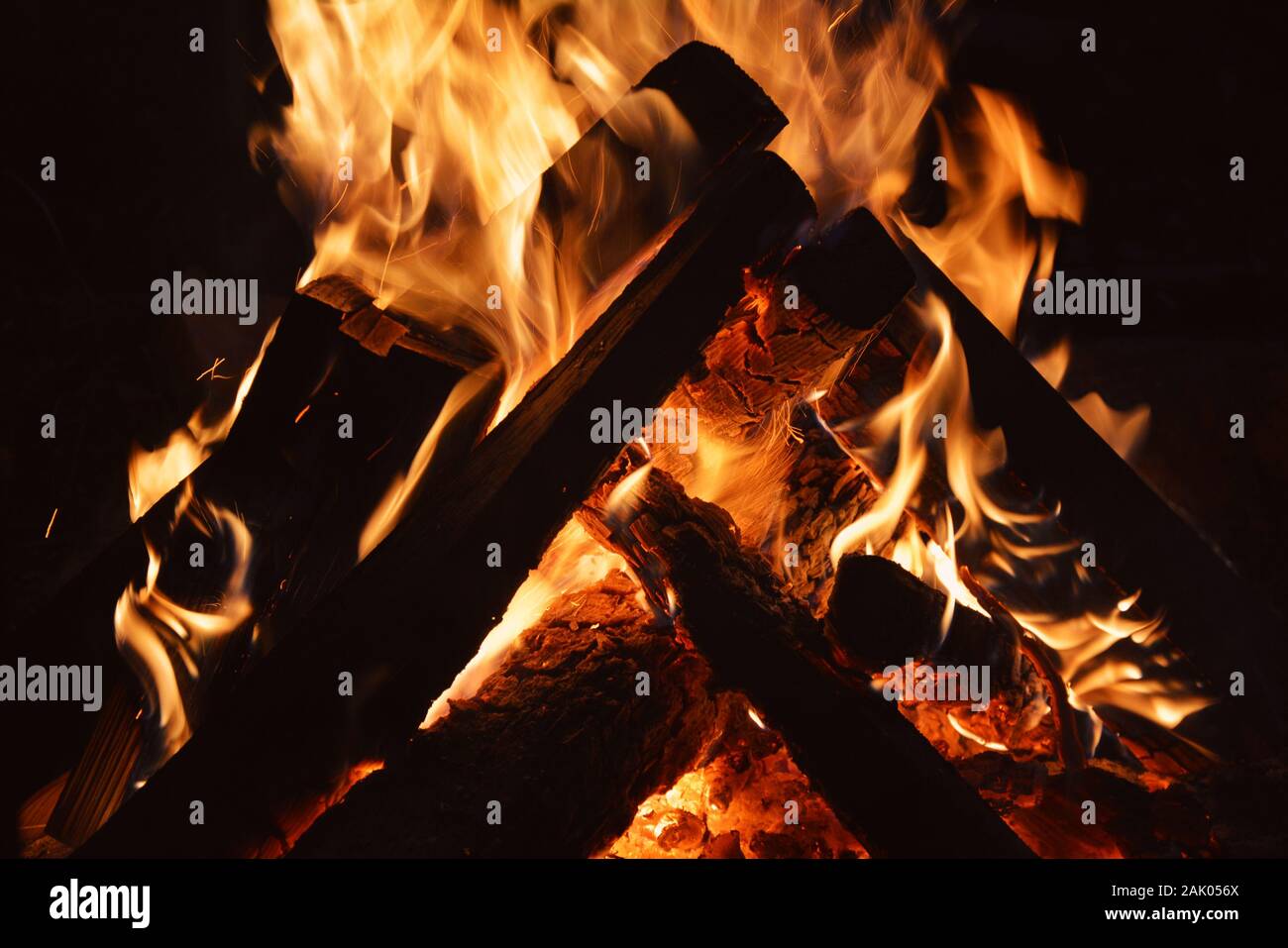 Fire - orange fire flames in the fireplace, burning wooden logs at ...