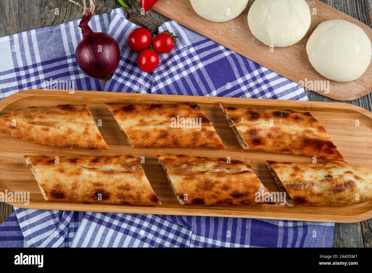 Traditional Turkish Cuisine Bafra pita (karadeniz pidesi) on rustic ...