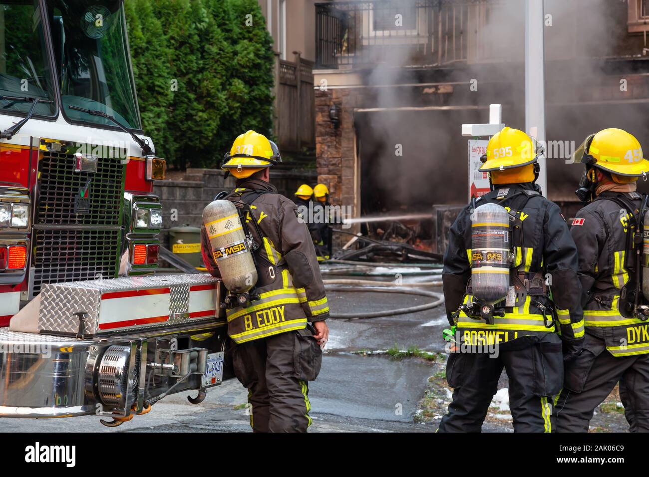 Firefighters are responding to a residential house fire Stock Photo - Alamy