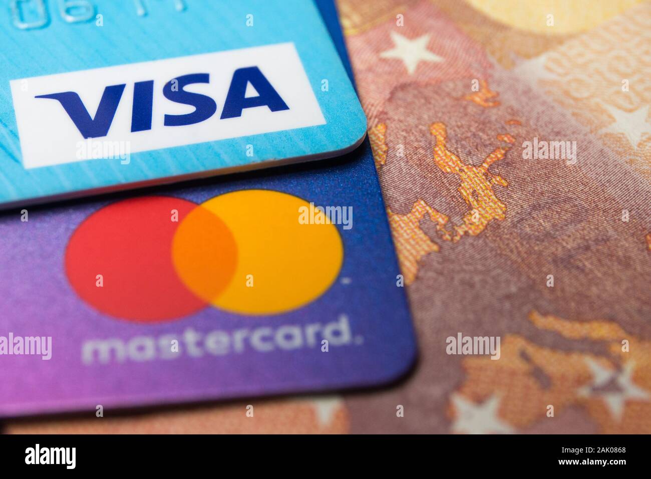 In this photo illustration a Visa credit card and Mastercard debit card ...