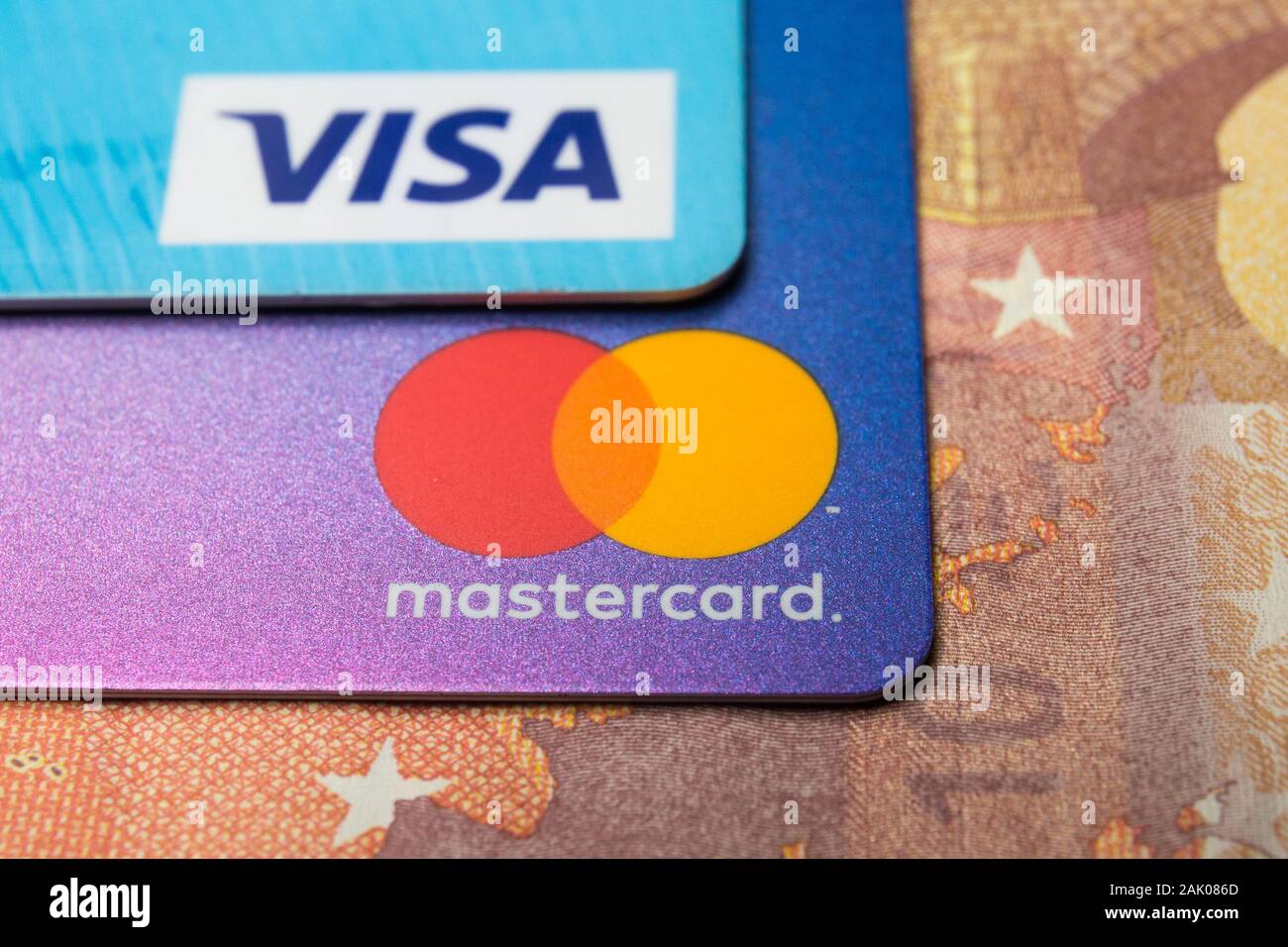 In this photo illustration a Visa credit card and Mastercard debit card ...