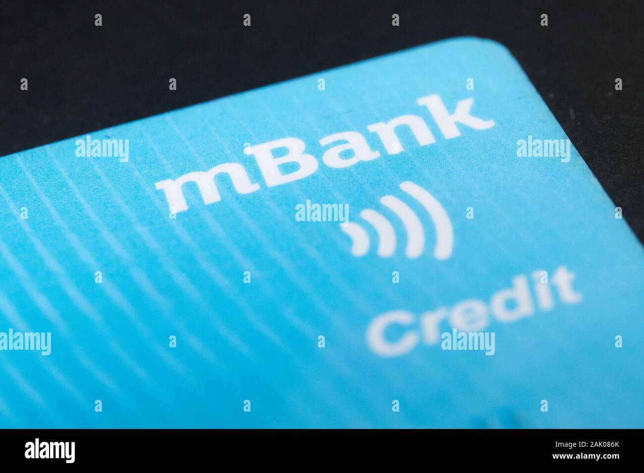 In this photo illustration a mBank logo seen on a Visa credit card ...