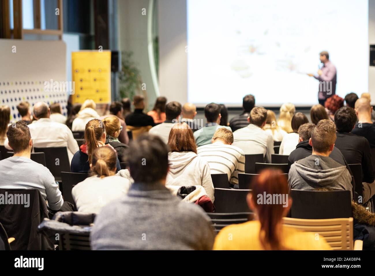 Business speaker giving a talk at business conference event Stock Photo ...