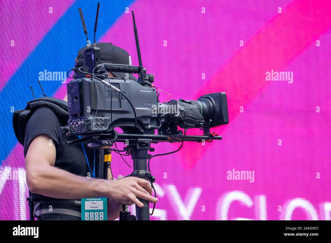 Steadicam camera man online broadcasting from stage Stock Photo - Alamy