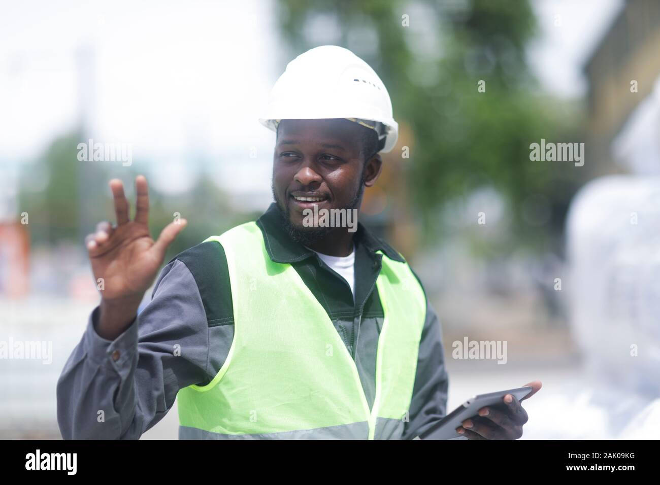 Black man helmet tablet hi-res stock photography and images - Alamy