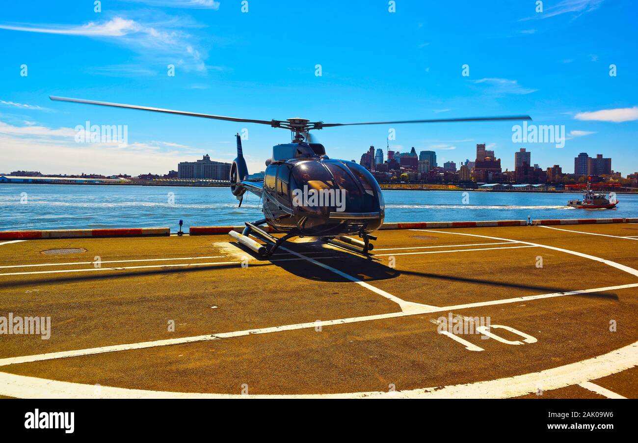 Black Helicopter on helipad in Lower Manhattan New York reflex Stock ...